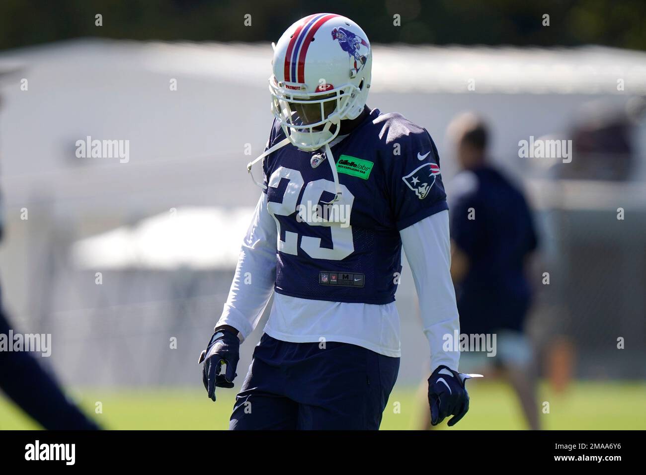 New England Patriots defensive back Brad Hawkins warms up during an NFL ...