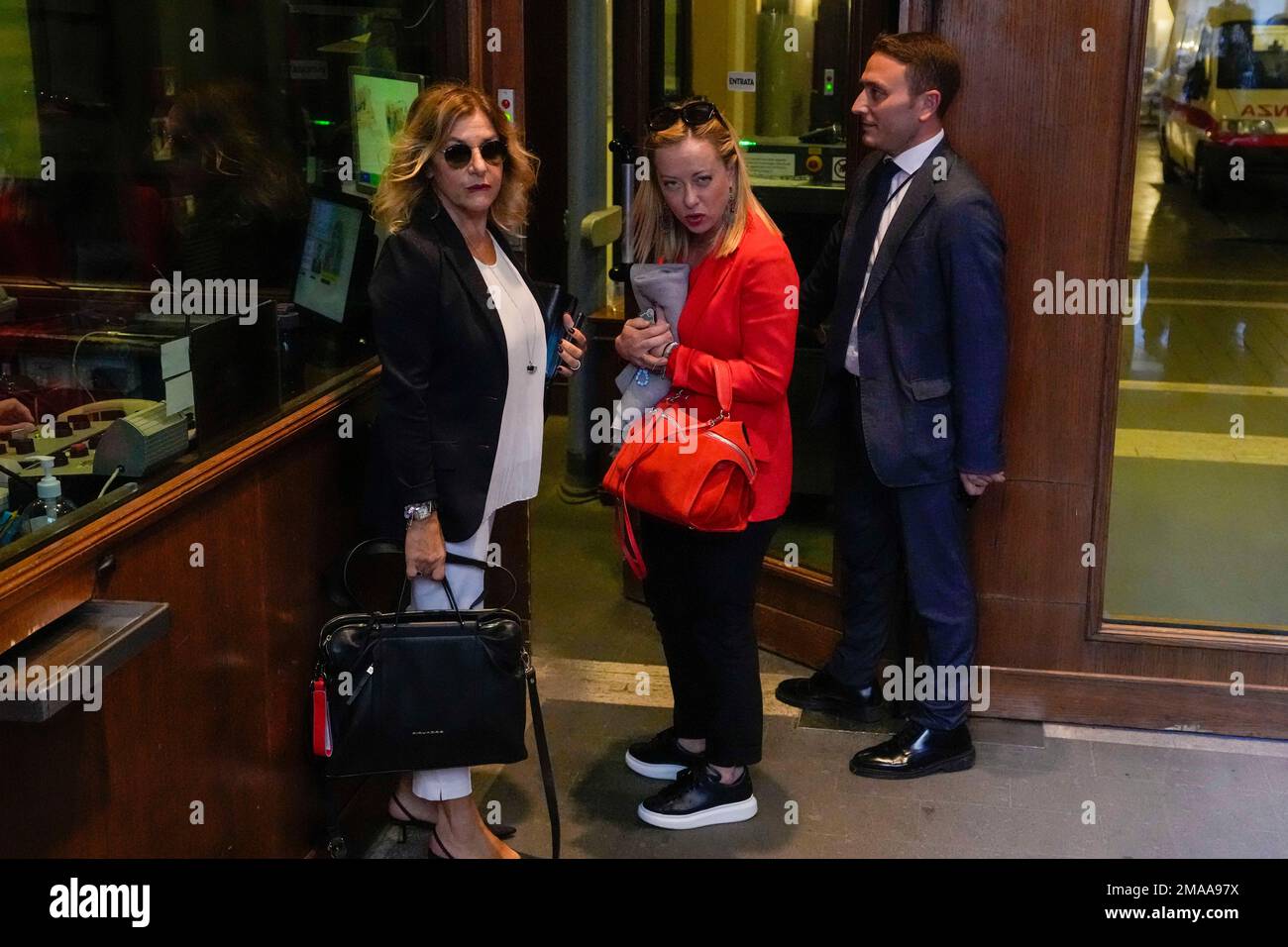 Leader of the Brothers of Italy party, Giorgia Meloni, center, arrives ...