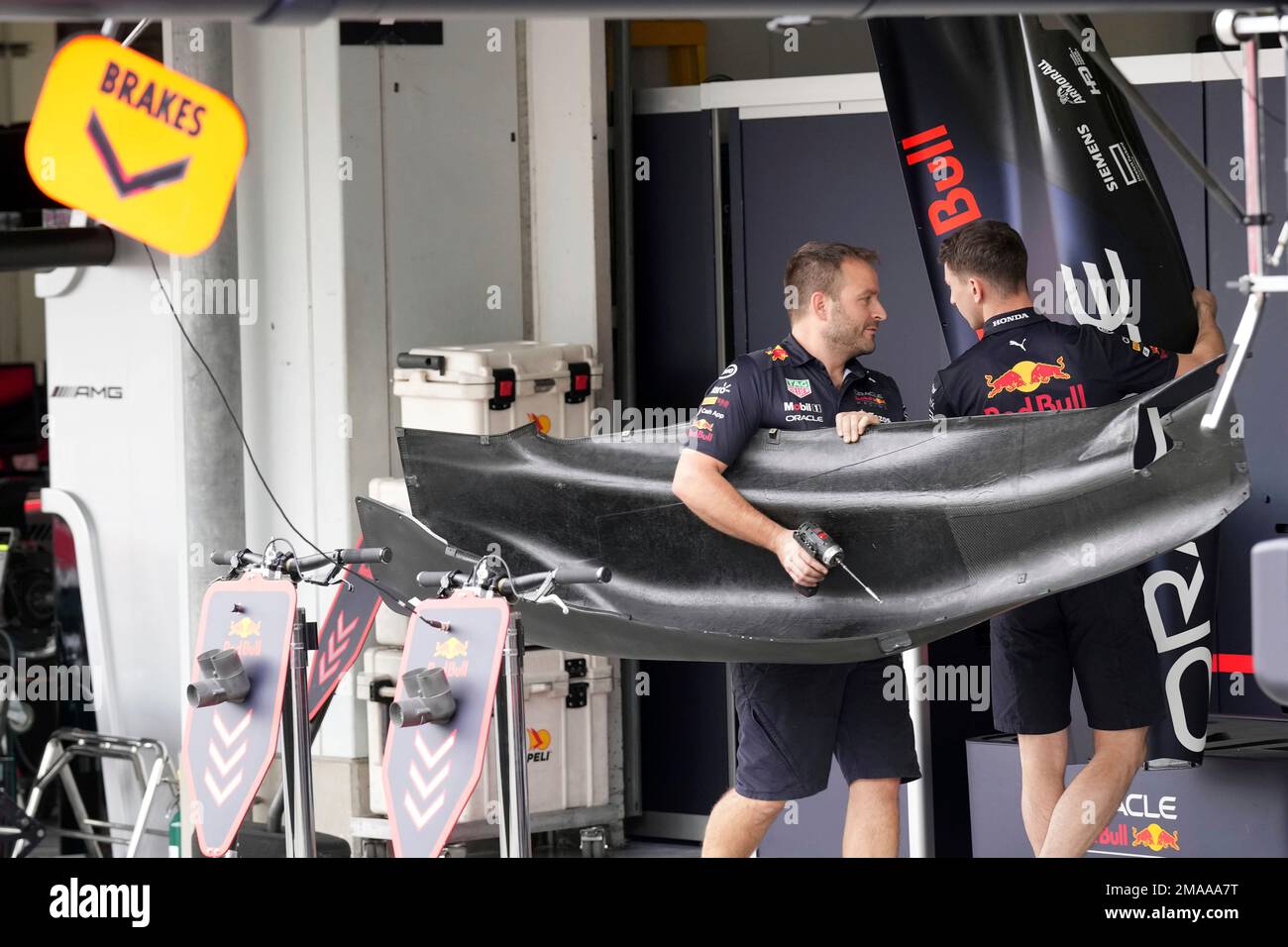 Red Bull team crew members prepare the car for Max Verstappen of the ...
