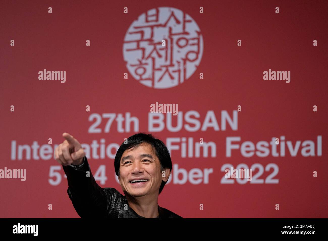 Hong Kong actor Tony Leung gestures during his press conference at the 27th Busan International ...