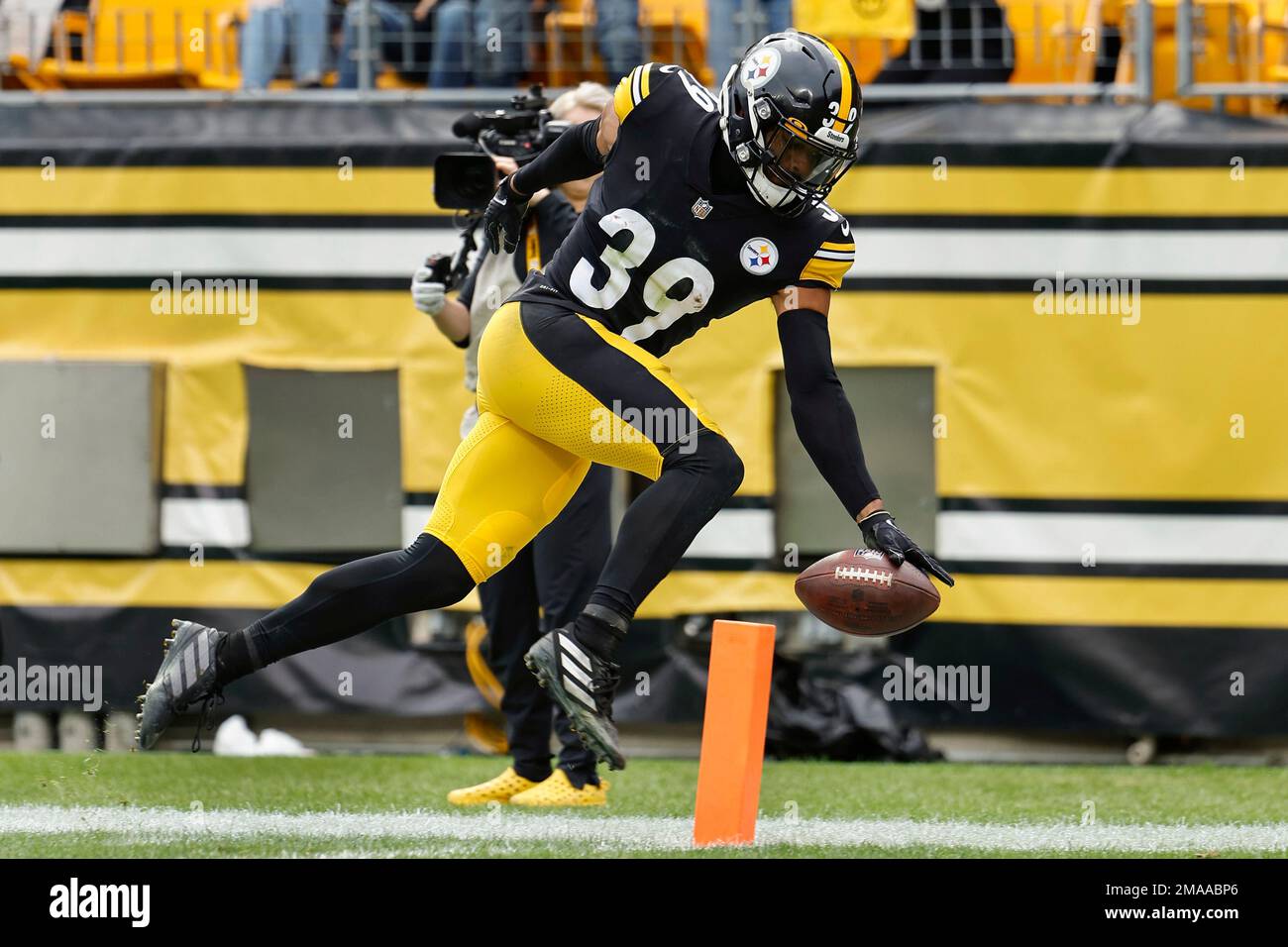 Pittsburgh Steelers safety Minkah Fitzpatrick runs back an interception ...