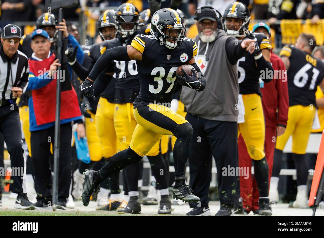 Pittsburgh Steelers safety Minkah Fitzpatrick runs back an interception ...