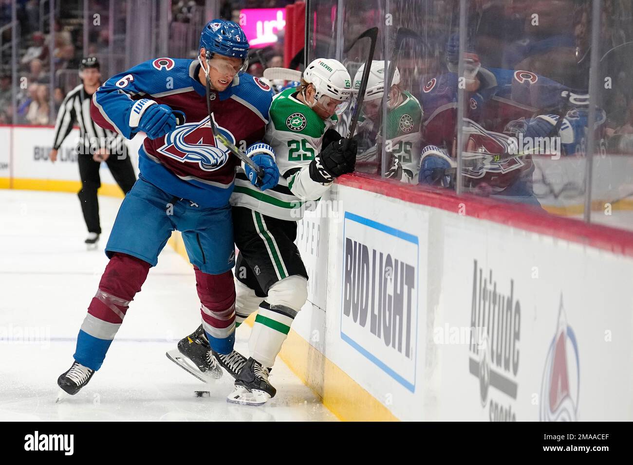 Colorado Avalanche defenseman Erik Johnson (6) checks Dallas Stars left ...