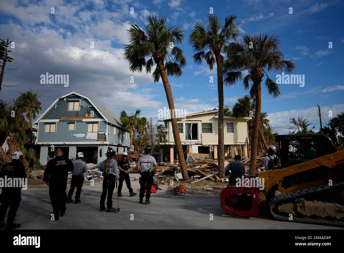 Members of Texas Task Force 1 search and rescue and Riviera Beach Fire ...