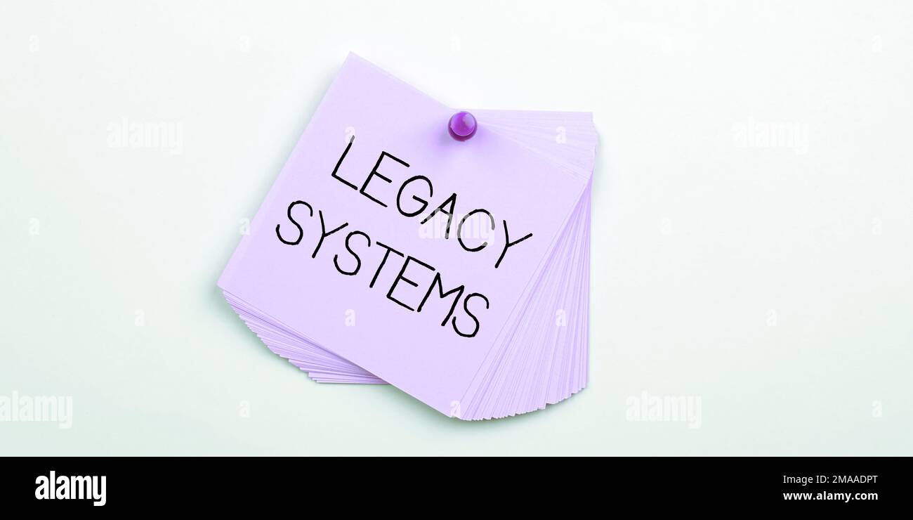 Hand writing sign Legacy Systems. Conceptual photo old method ...