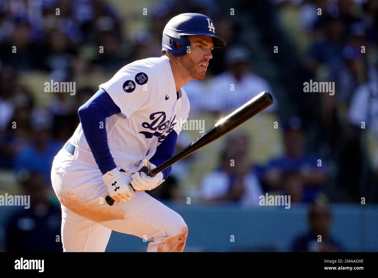 Los Angeles Dodgers' Freddie Freeman watches his RBI single during the ...