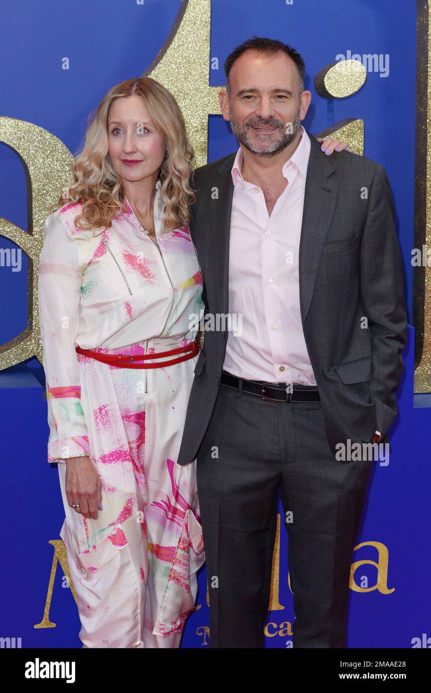 Matthew Warchus, right, and Lauren Ward poses for photographers upon ...