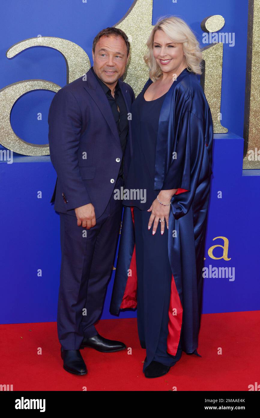 Stephen Graham, left, kisses Hannah Walters upon arrival for the ...