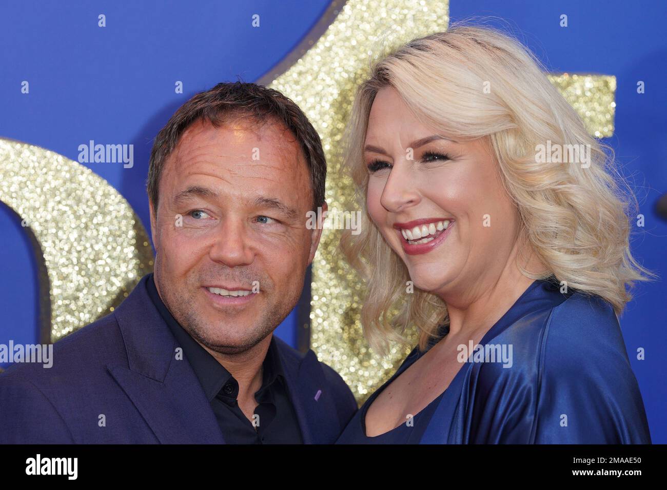 Stephen Graham, left, kisses Hannah Walters upon arrival for the ...