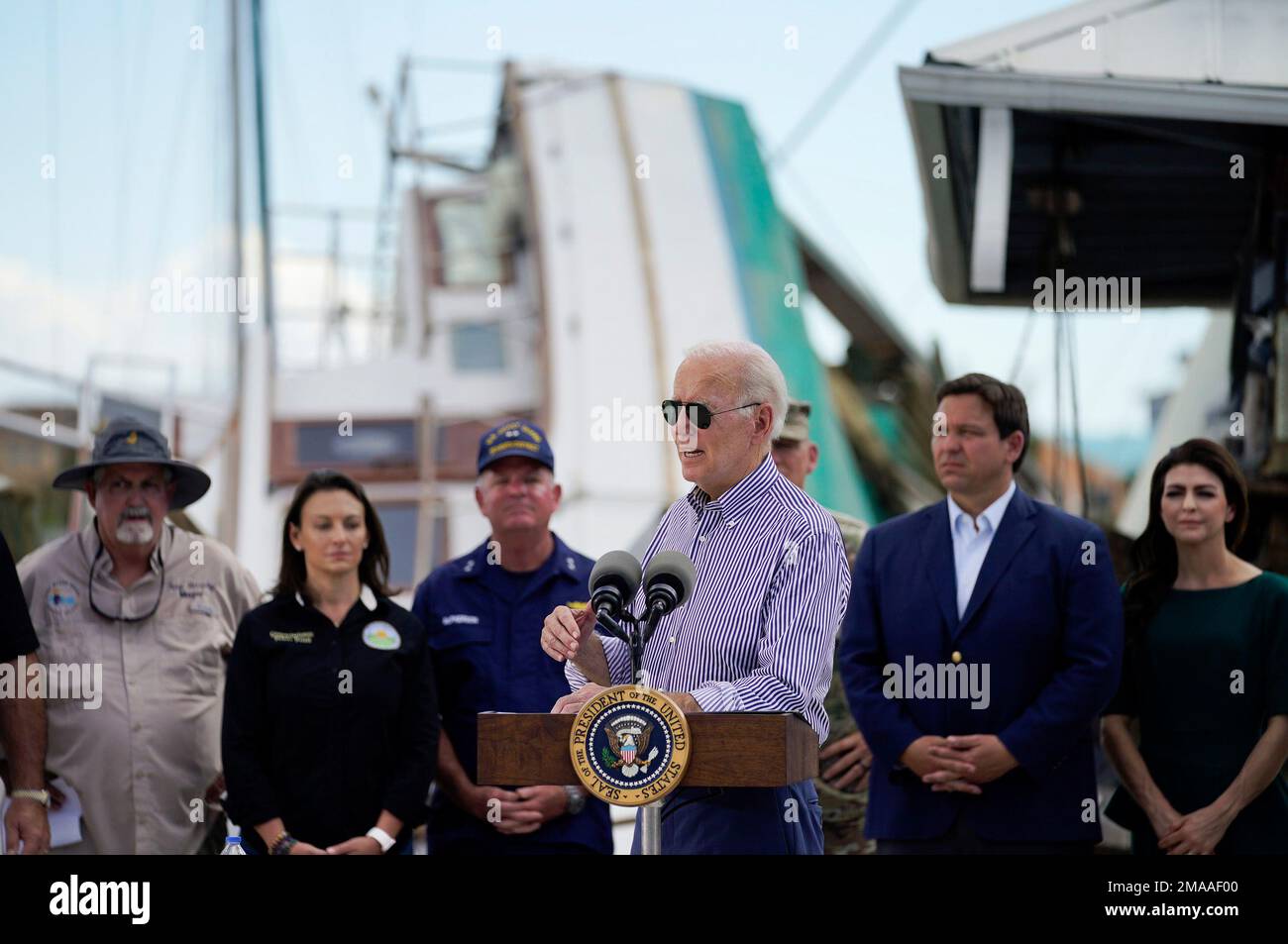 President Joe Biden speaks after touring an area impacted by Hurricane ...
