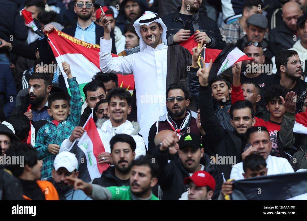 Iraqis fans wait inside the stadium before the Arabian Gulf Cup ...