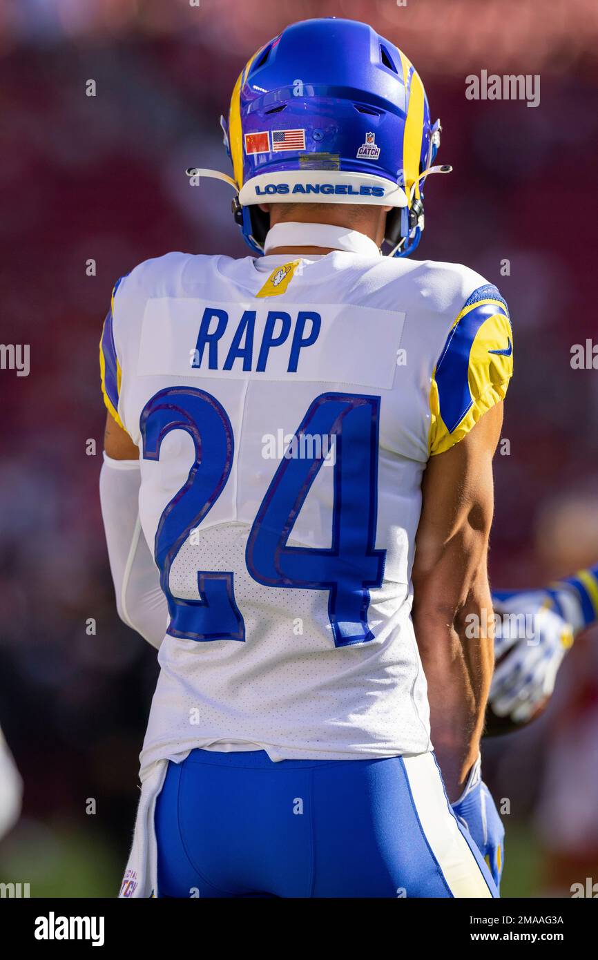 Safety (24) Taylor Rapp of the Los Angeles Rams warms up wearing a flag ...