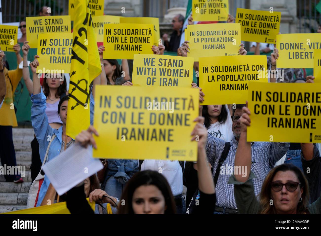 Amnesty International activists organize a sit-in at Rome's Capitol ...