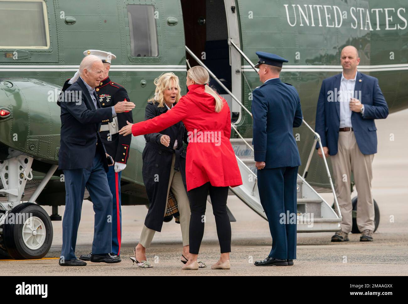 President Joe Biden and first lady Jill Biden are greeted by Col ...