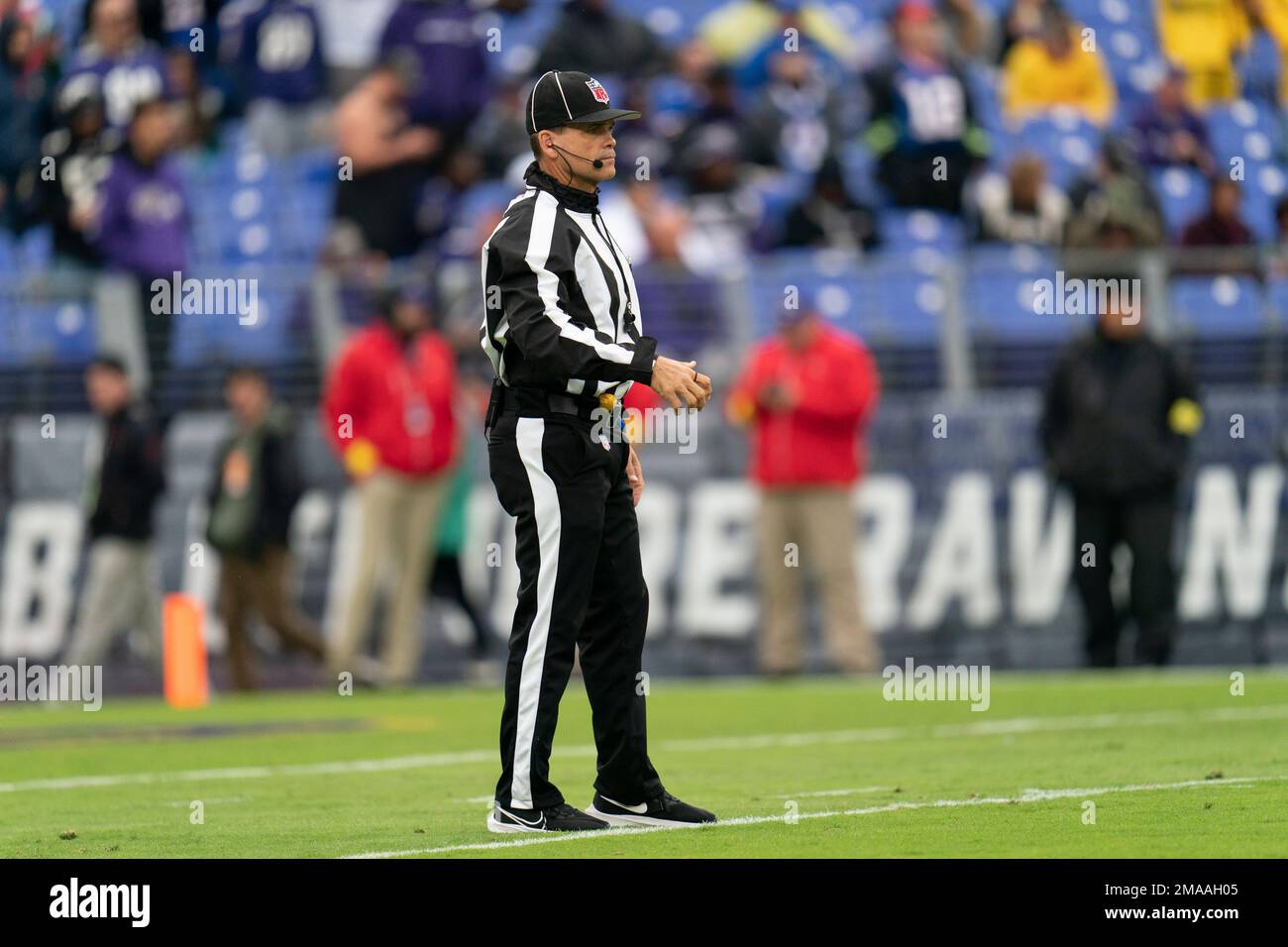 NFL back judge Steve Patrick (17) looks on during the warmups prior to ...