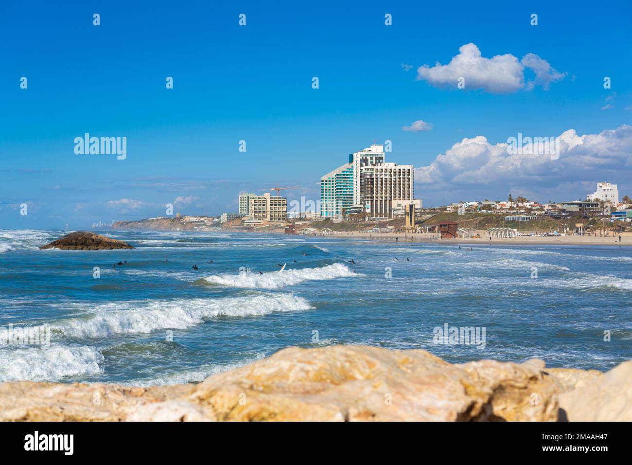 View from the stone shore to the bay with the city landscape Stock ...
