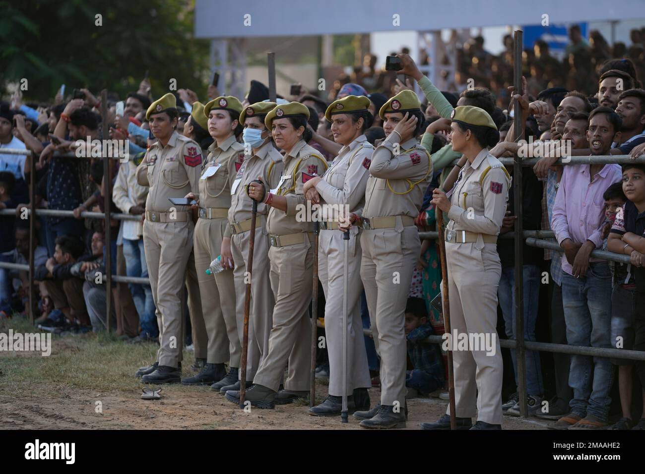 Jammu and Kashmir policewomen watch a Dussehra procession in Jammu ...