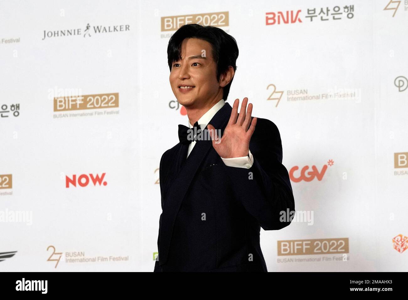 South Korean actor Kwon Yul waves as he arrives to attend the opening ceremony of the 27th Busan ...
