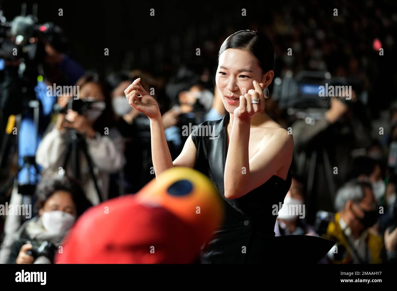 South Korean actress Han Ye-ri poses as she arrives to attend the opening ceremony of the 27th ...