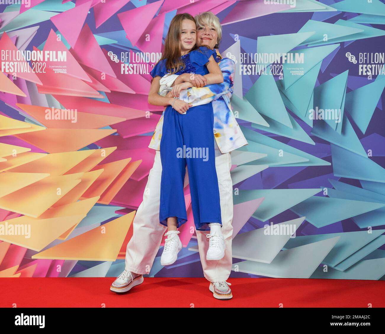 Emma Thompson, left, and Alisha Weir pose for photographers at the ...