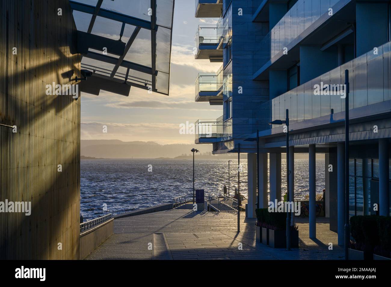 View down Tjuvholmen Allé at Aker Brygge between modern buildings in ...