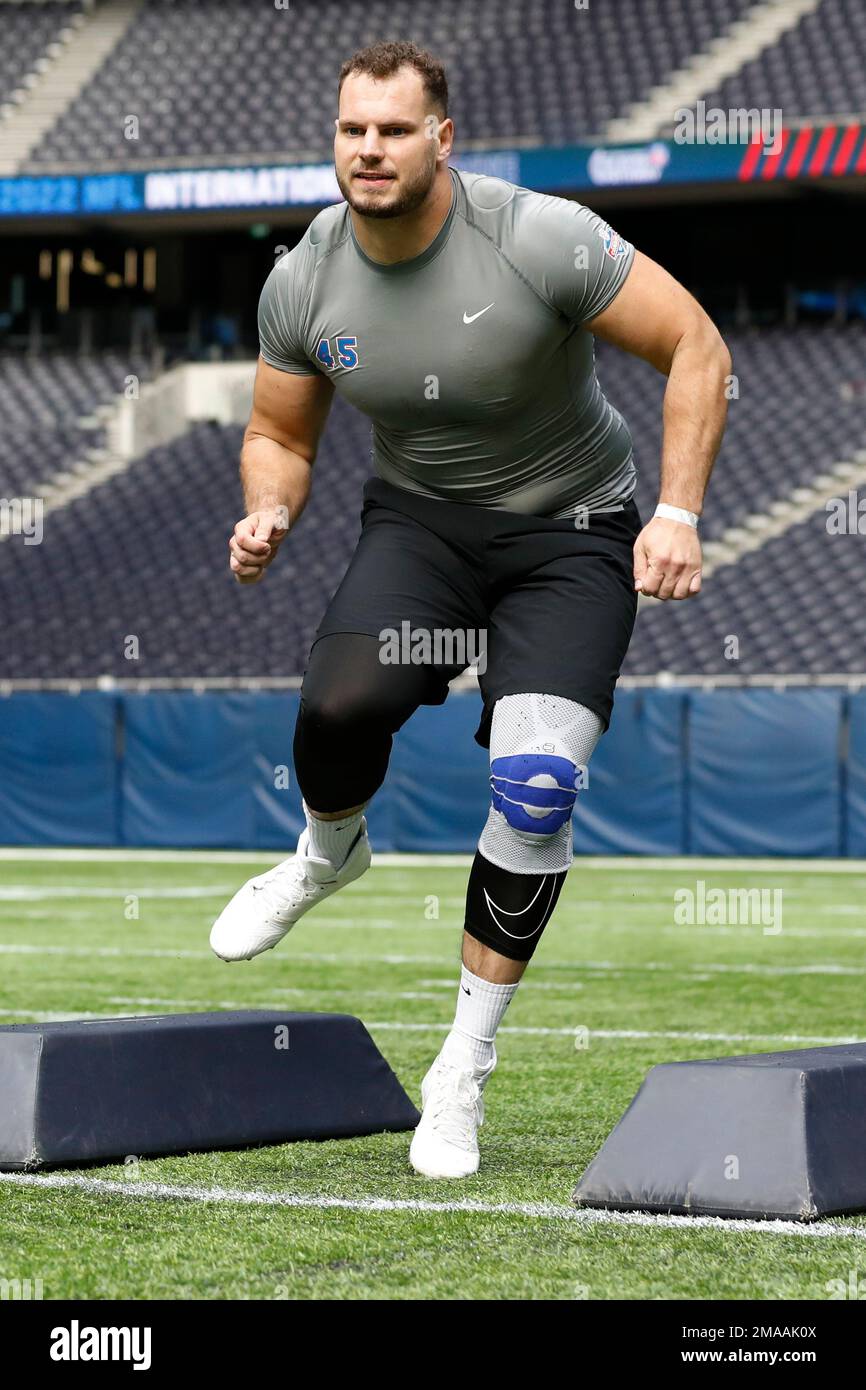 Defensive lineman Tim Haenni, of Switzerland, participates in a drill ...