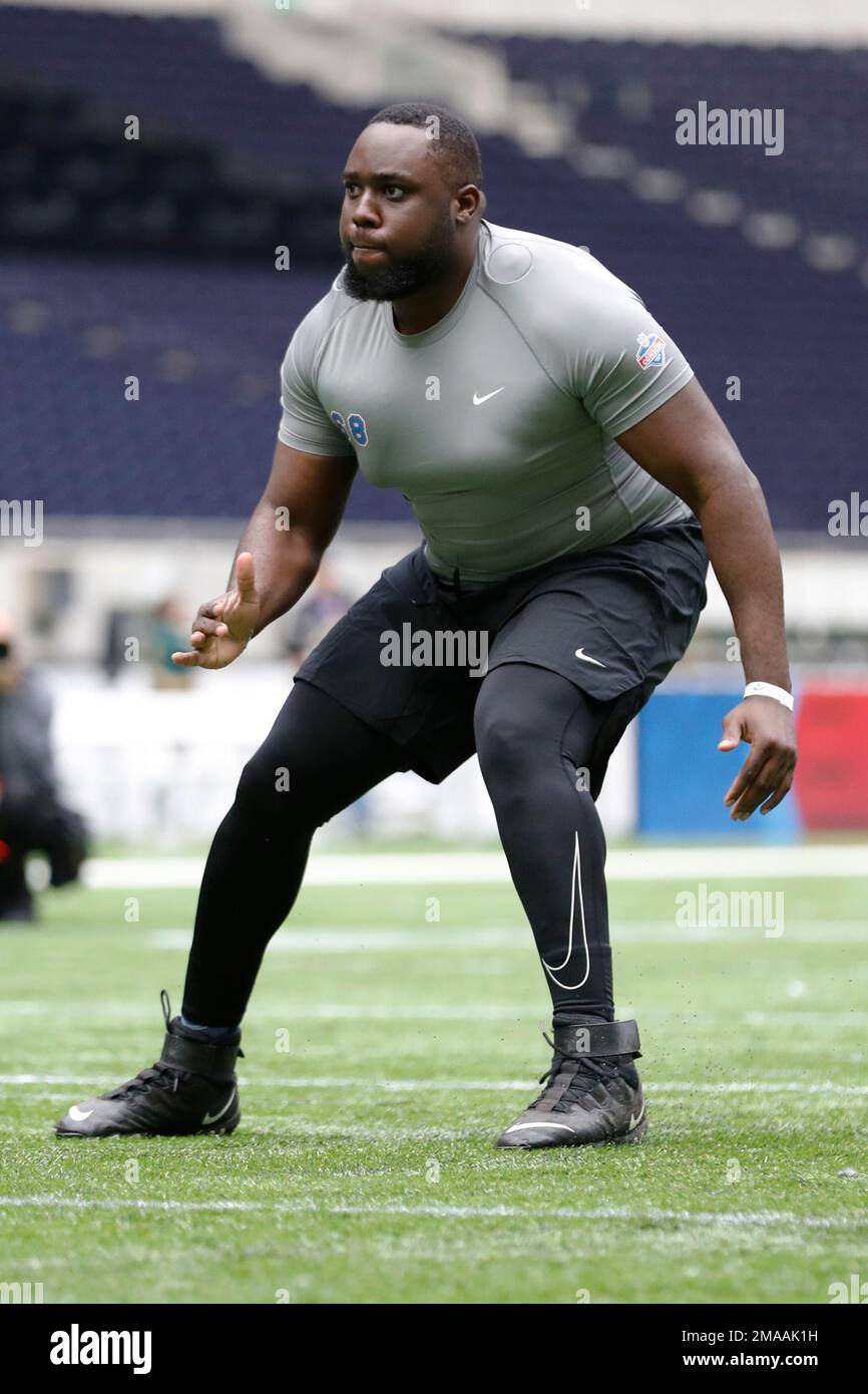 Offensive lineman Amos Laoye, of Nigeria, participates in a drill at ...