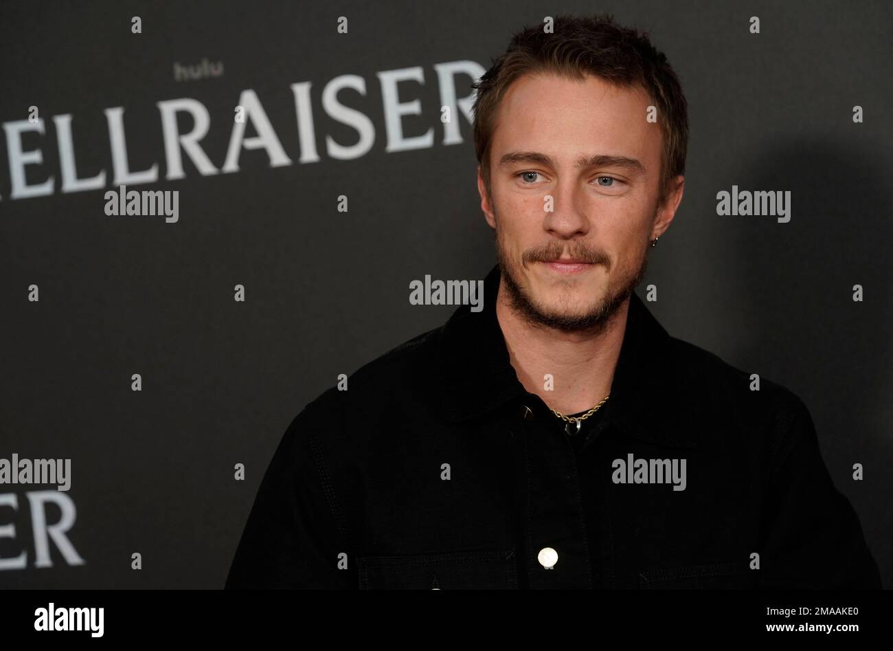 Drew Starkey poses at a special screening of the Hulu reboot of ...