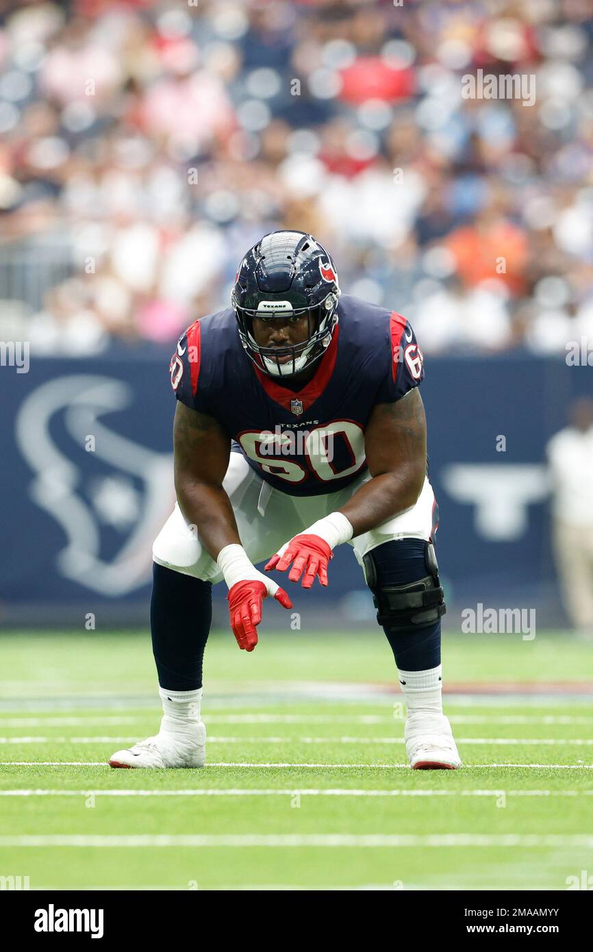 Houston Texans offensive lineman A.J. Cann (60) lines up for the snap ...