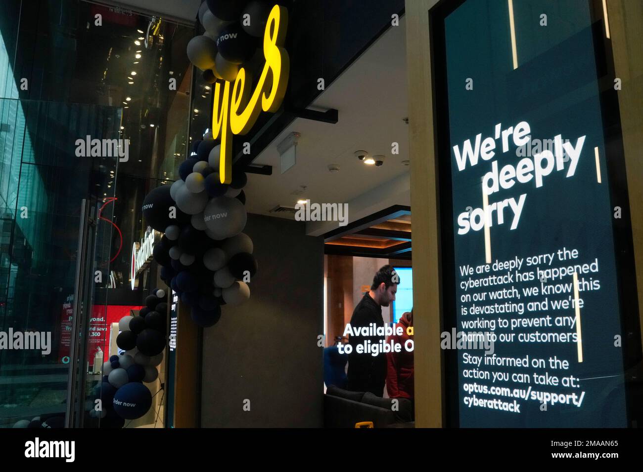 Electronic signage at an Optus telecommunications retail store in the ...