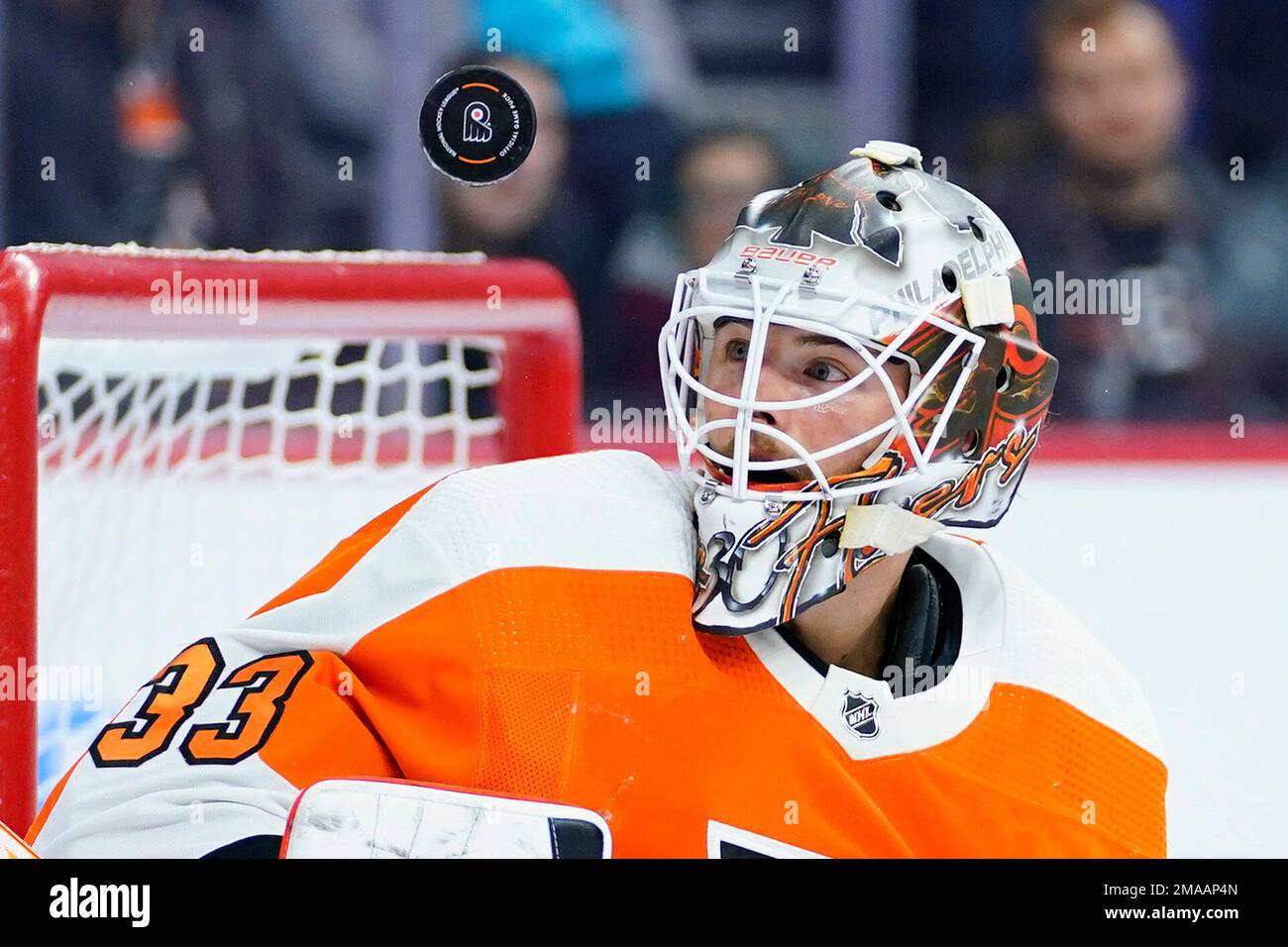 Philadelphia Flyers goaltender Samuel Ersson watches the puck after ...