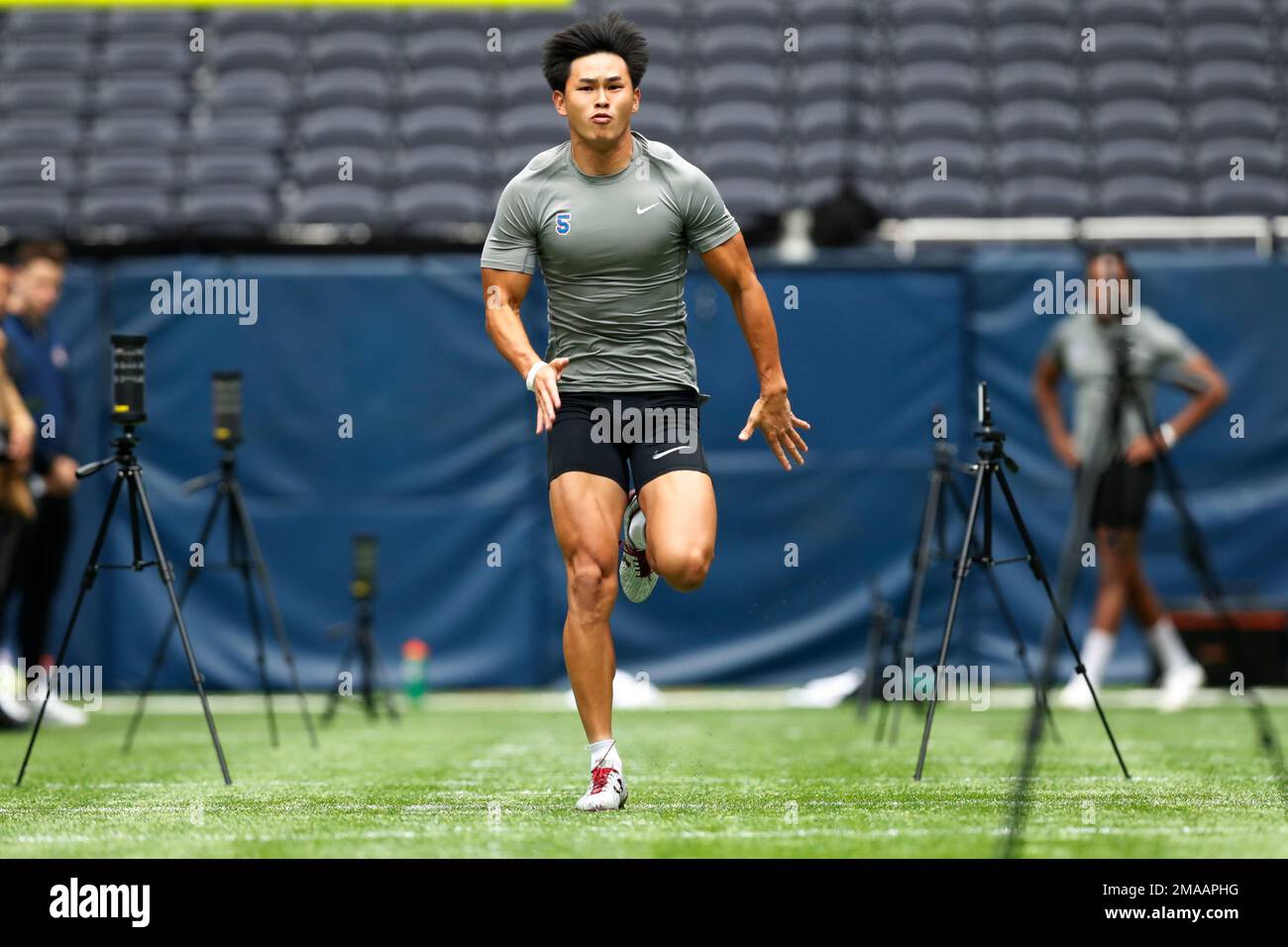Wide receiver Riki Matsui, of Japan, runs the 40-yard dash at the NFL ...