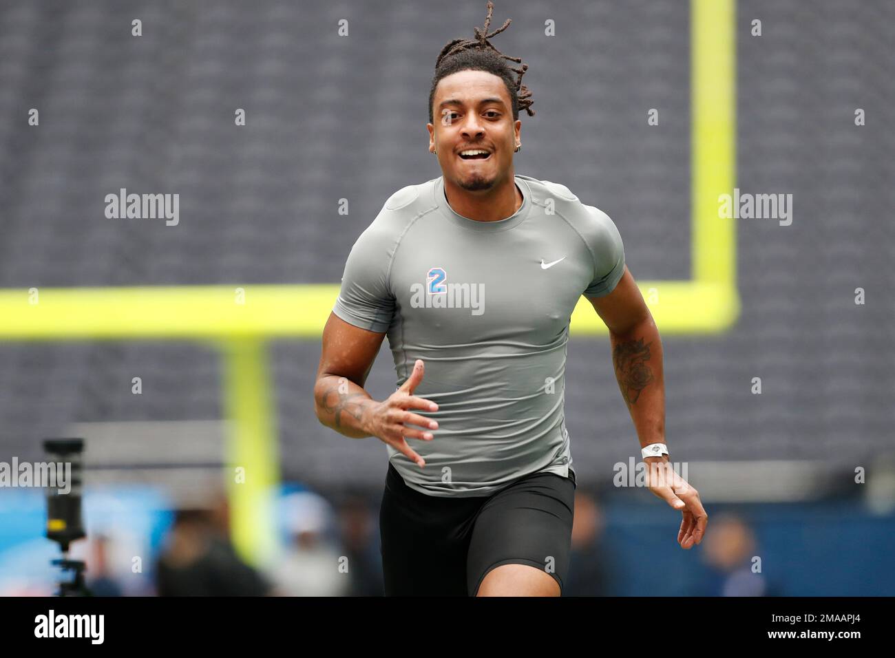 Defensive back Kevin Fortes, of France, runs the 40-yard dash at the ...