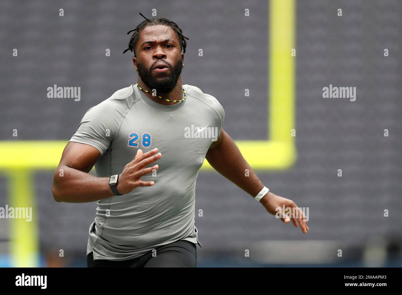 Linebacker Jai Jackson, of the United Kingdom, runs the 40-yard dash at the NFL international ...