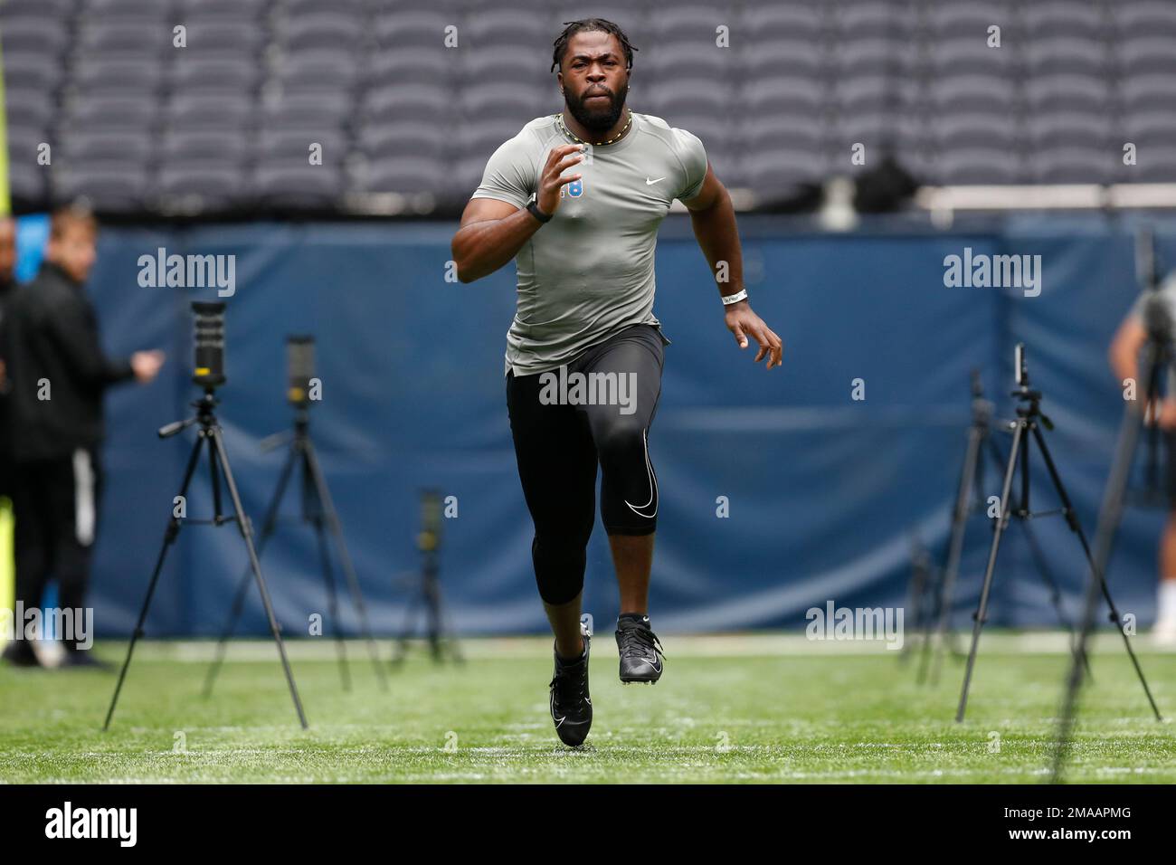 Linebacker Jai Jackson, of the United Kingdom, runs the 40-yard dash at ...
