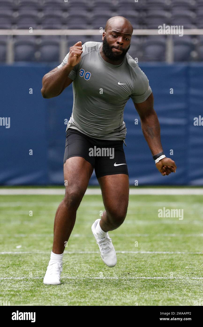 Running back Andy Owusu, of the United Kingdom, participates in a drill ...
