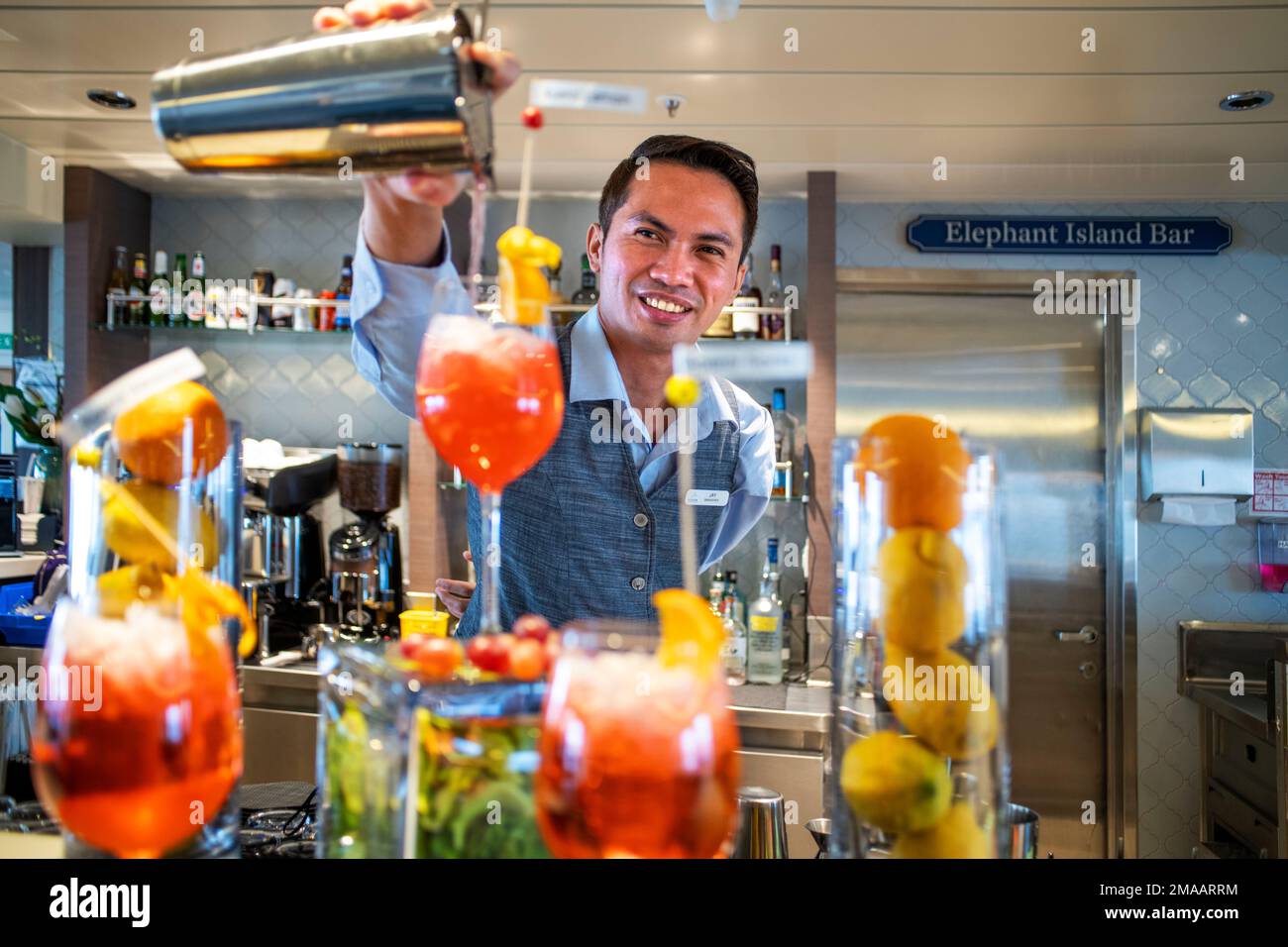 Cocktail bar in the expedition cruise vessel Greg Mortimer in Svalbard ...