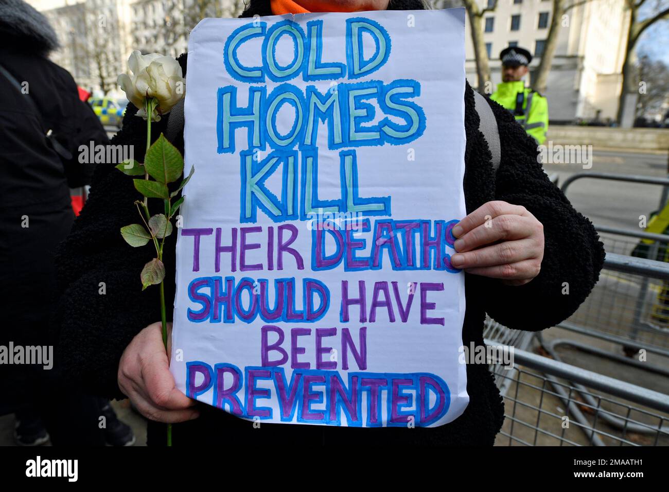 Protesters campaigning against people dying of cold, as they deliver a ...