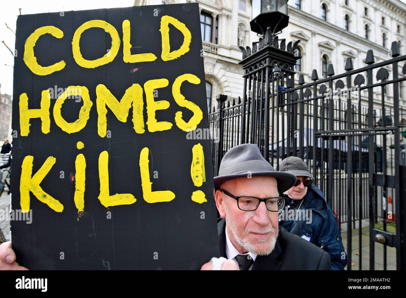 Protesters campaigning against people dying of cold, as they deliver a ...