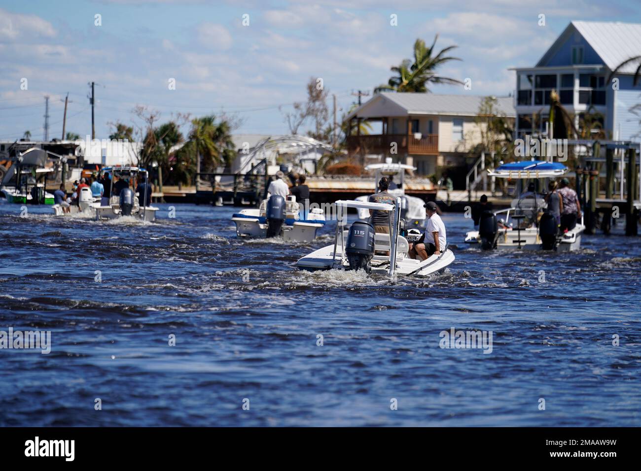 FILE - Boats operated by resident good Samaritans help evacuate ...