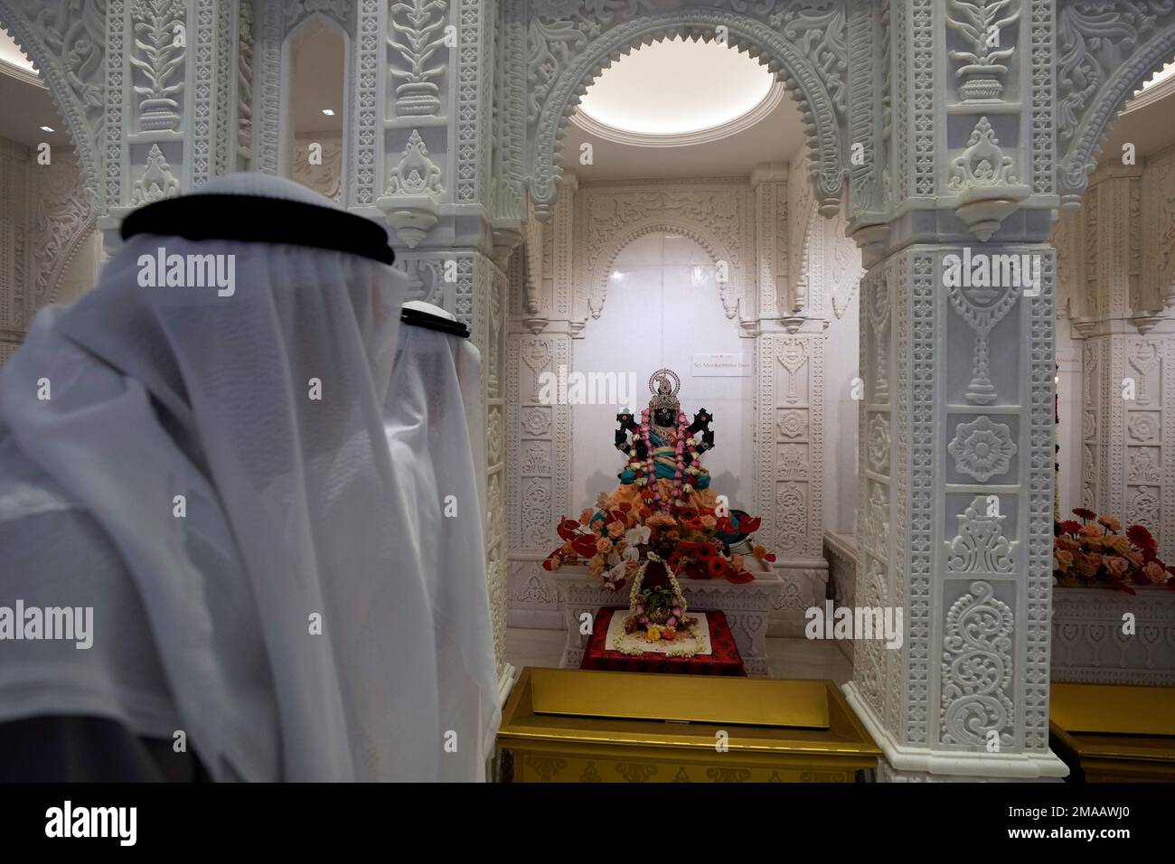 Guests visit during the opening ceremony of the new Hindu temple, in ...