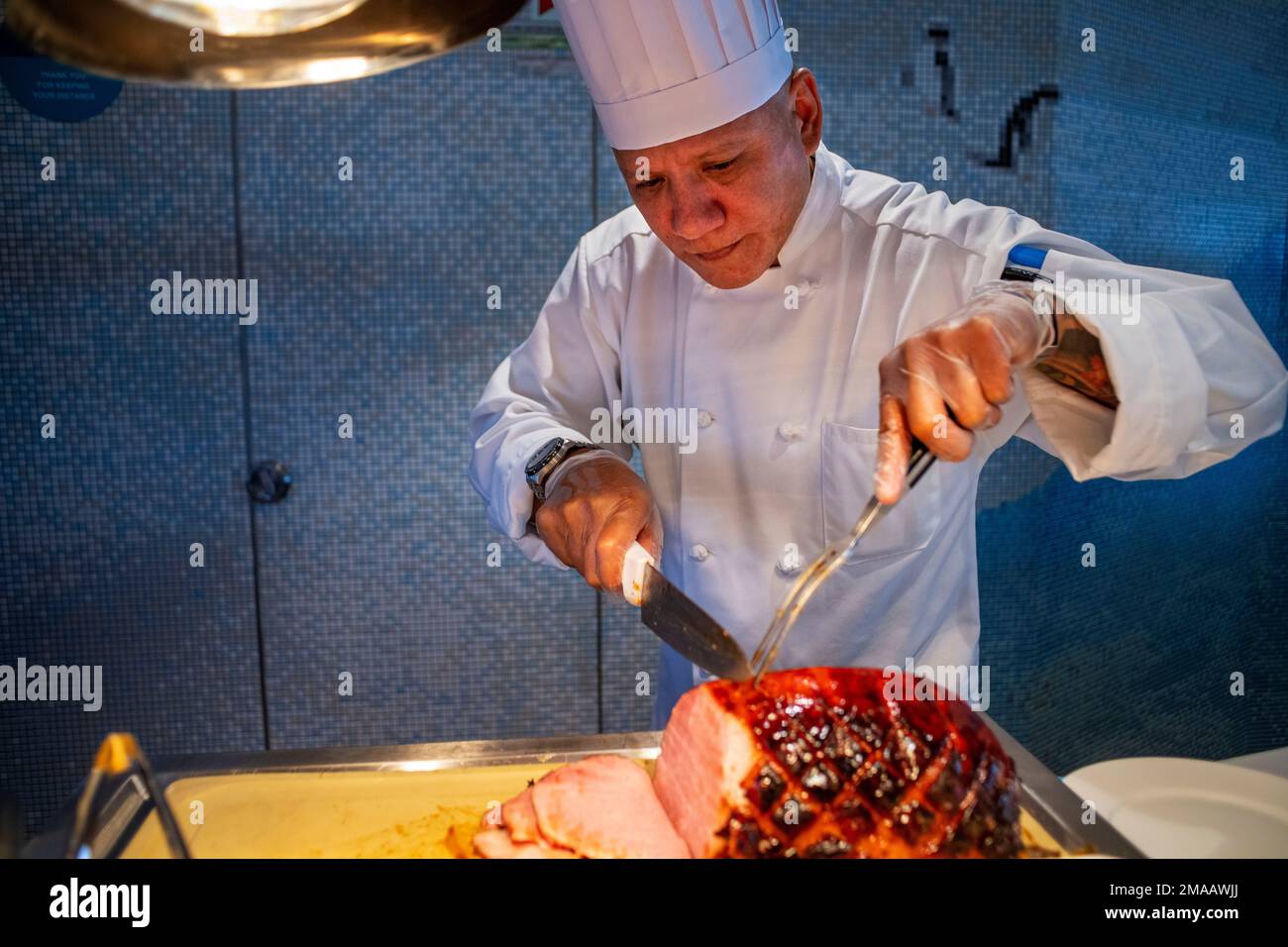 One of the chef cooks prepares a delicious roast in the expedition ...