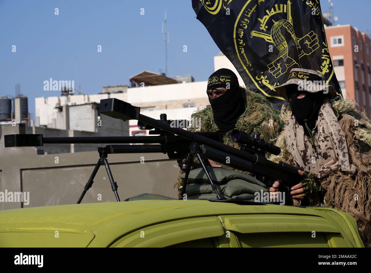 Masked members of the Palestinian Al-Quds Brigades, the military wing ...