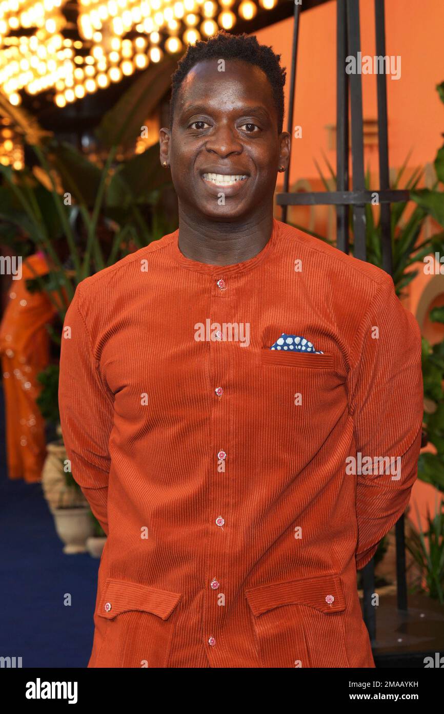Kobna Holdbrook-Smith poses for photographers upon arrival for the UK ...