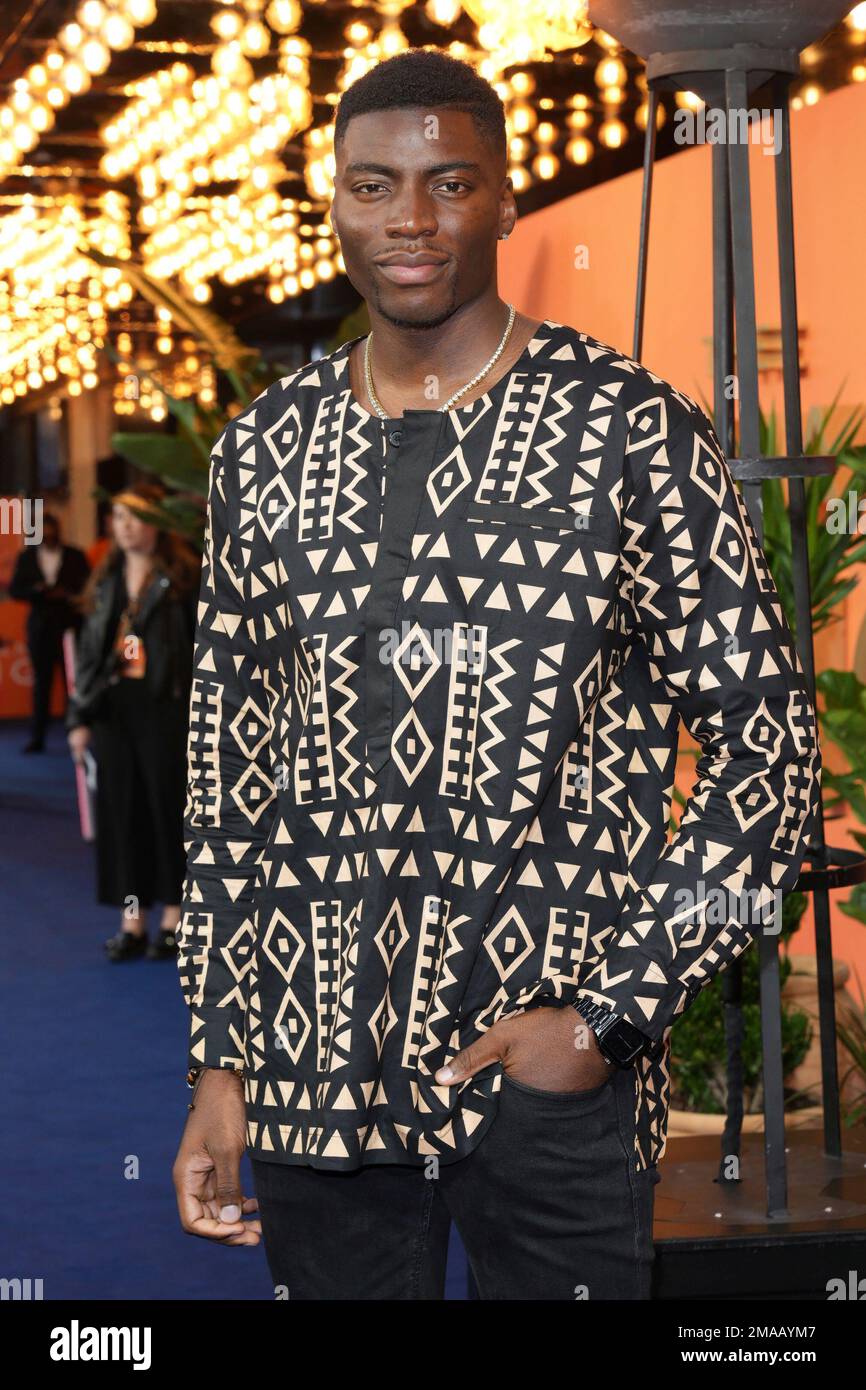 Jesse Chuku poses for photographers upon arrival for the UK Gala ...