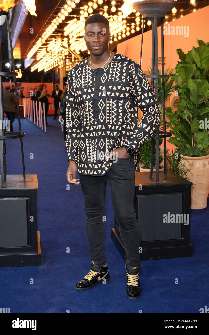 Jesse Chuku poses for photographers upon arrival for the UK Gala ...