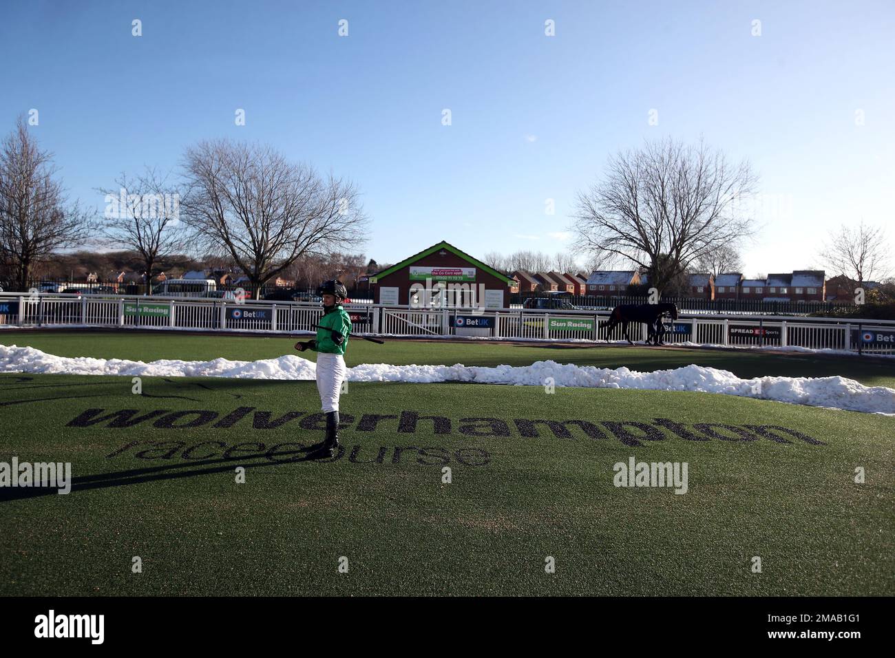 Jockey Laura Pearson in the parade ring at Wolverhampton Racecourse ...