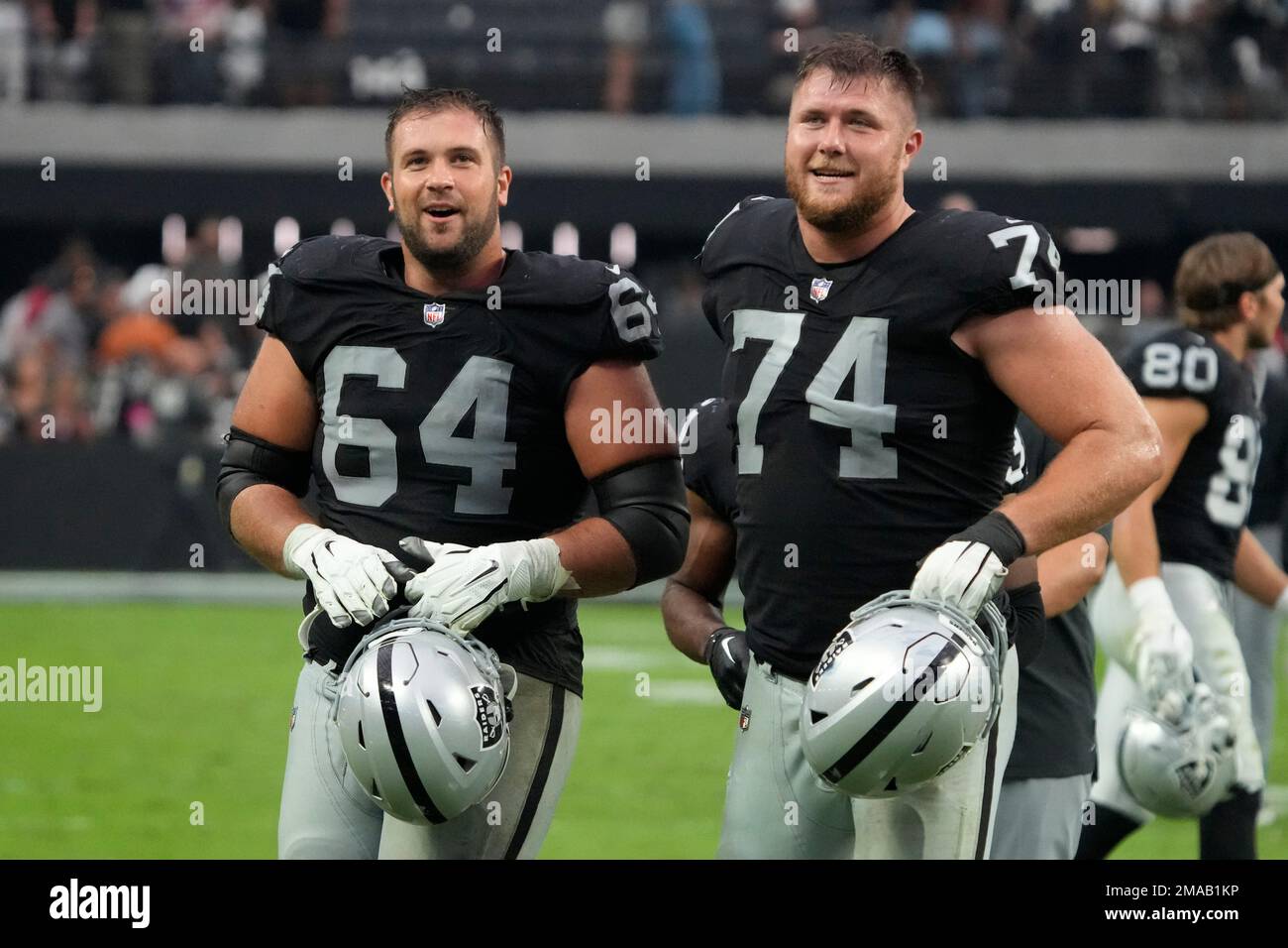 Las Vegas Raiders guard Alex Bars (64) and offensive tackle Kolton ...