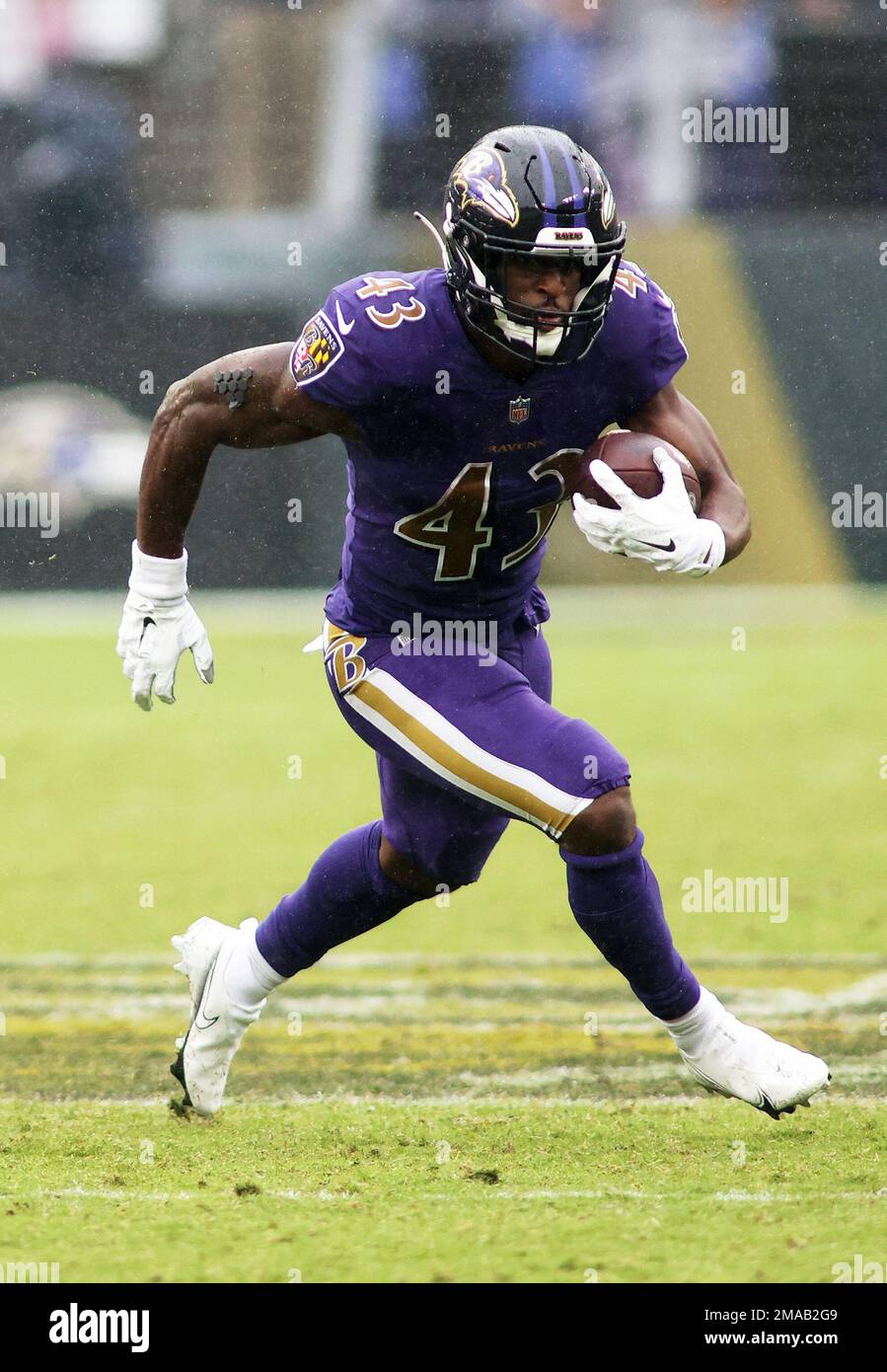 Baltimore Ravens running back Justice Hill (43) runs during an NFL ...
