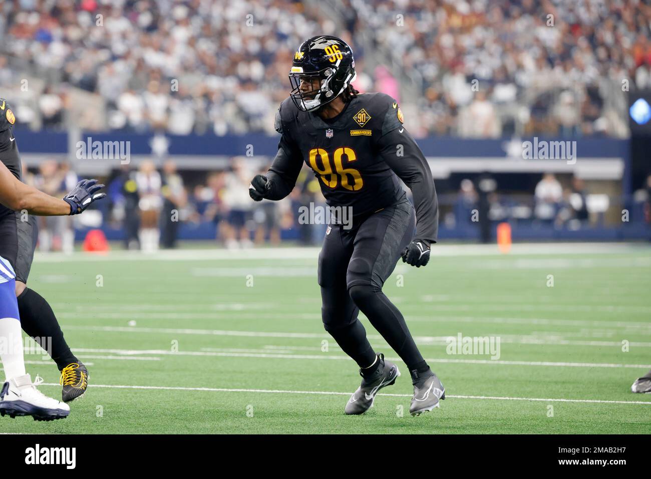 Washington Commanders defensive end James Smith-Williams (96) defends ...
